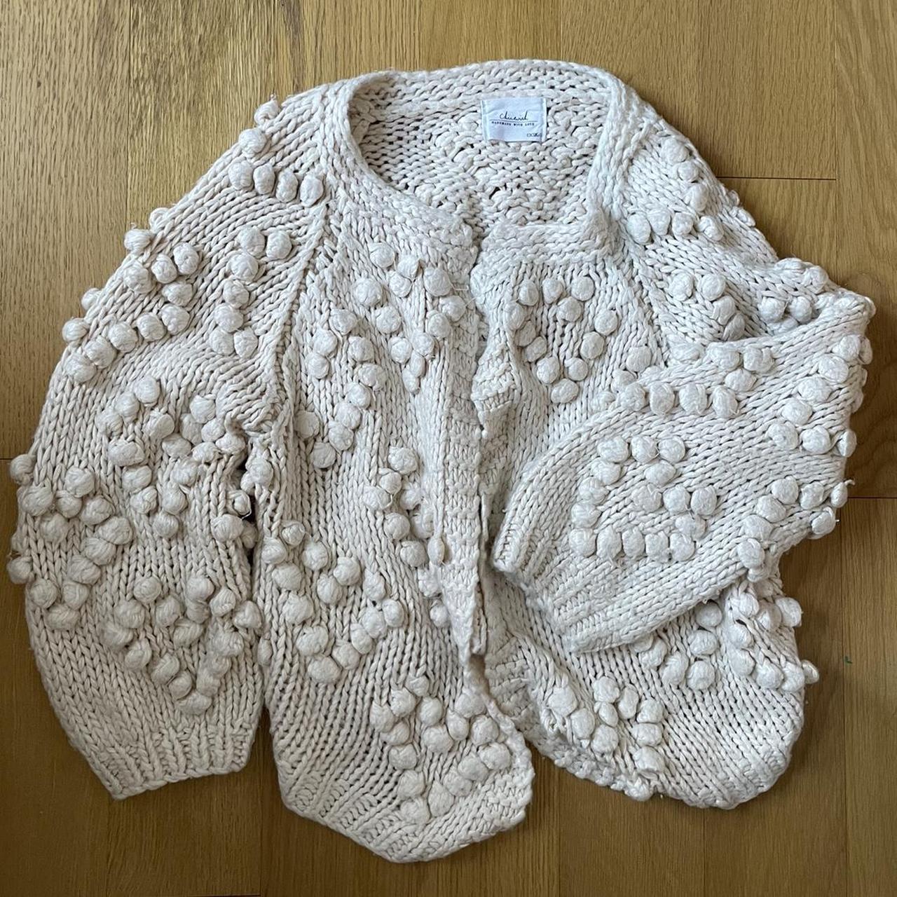 Cream sweater cardigan thing Has puff balls in the... - Depop
