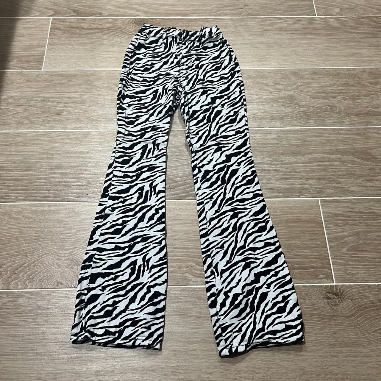 motel zebra flare pants size xs super flattering... - Depop