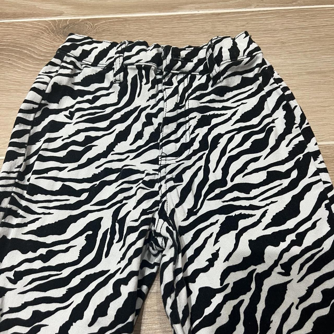 motel zebra flare pants size xs super flattering... - Depop