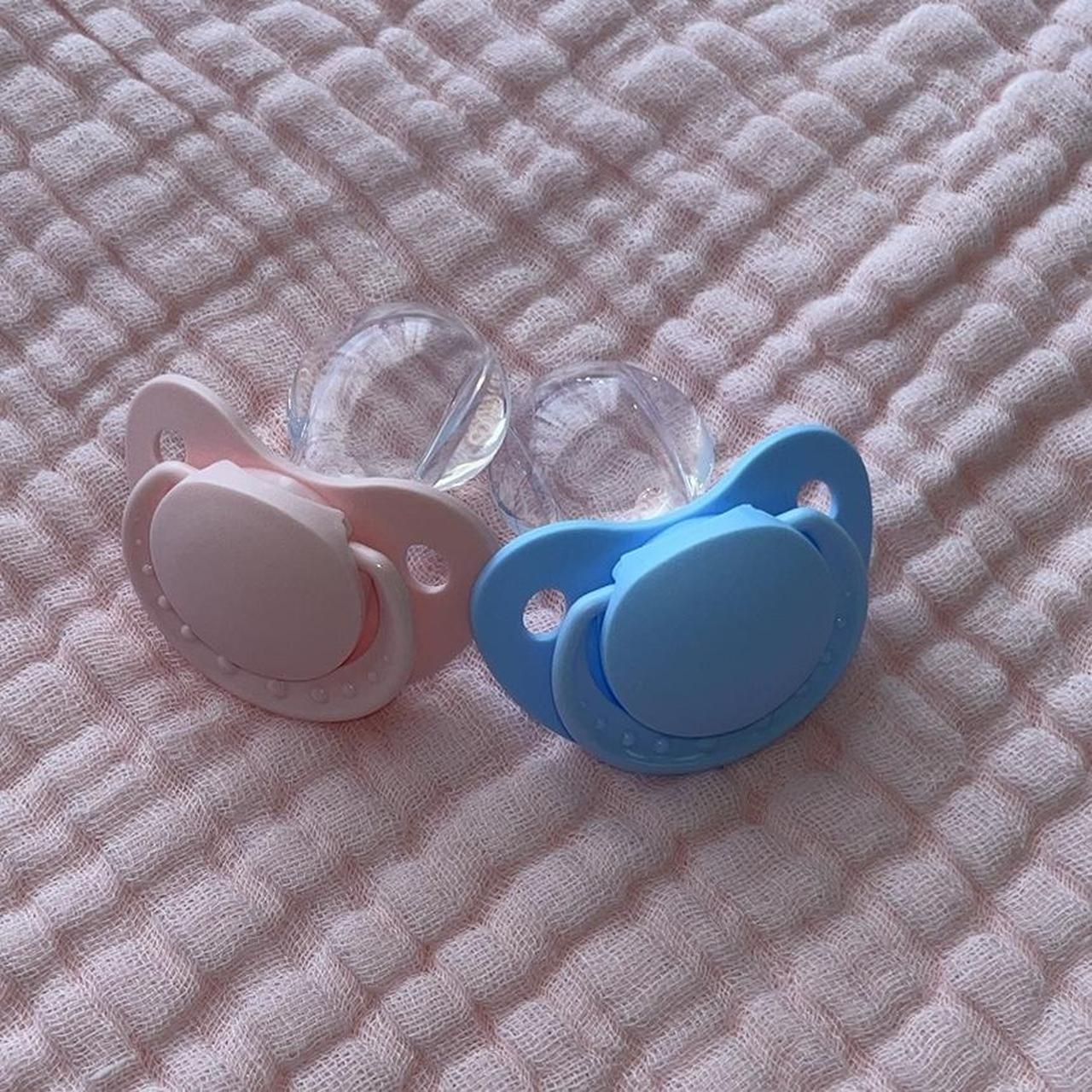 Adult Pink + Blue Binky: never used, brand new, can... - Depop