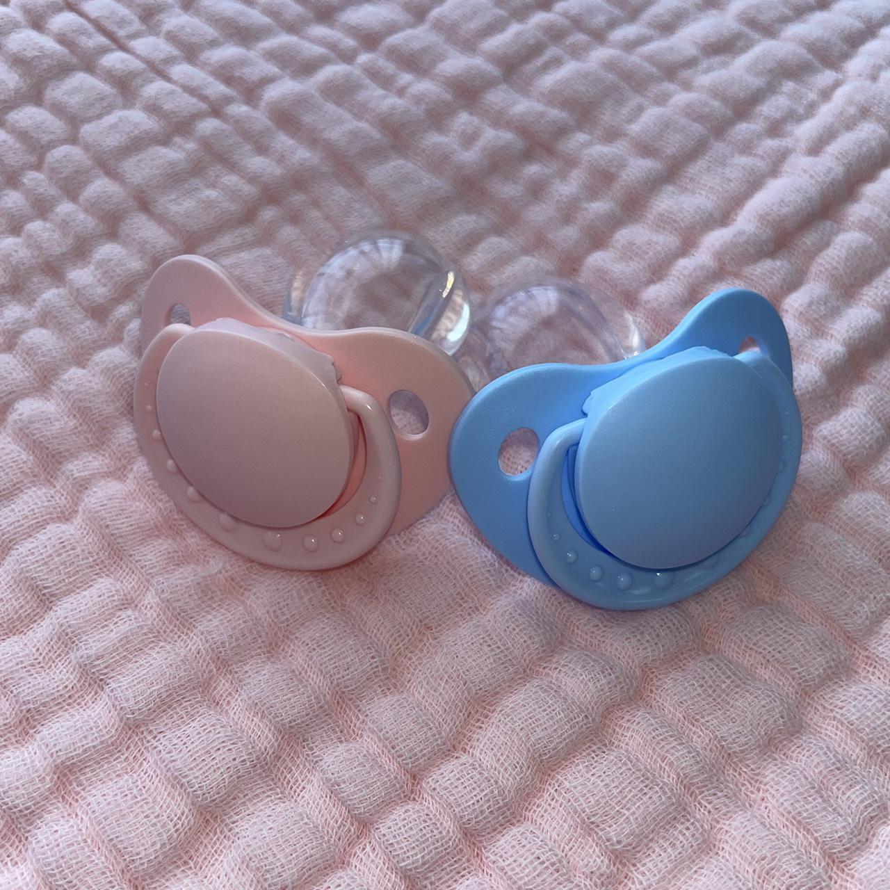 Adult Pink + Blue Binky: never used, brand new, can... - Depop