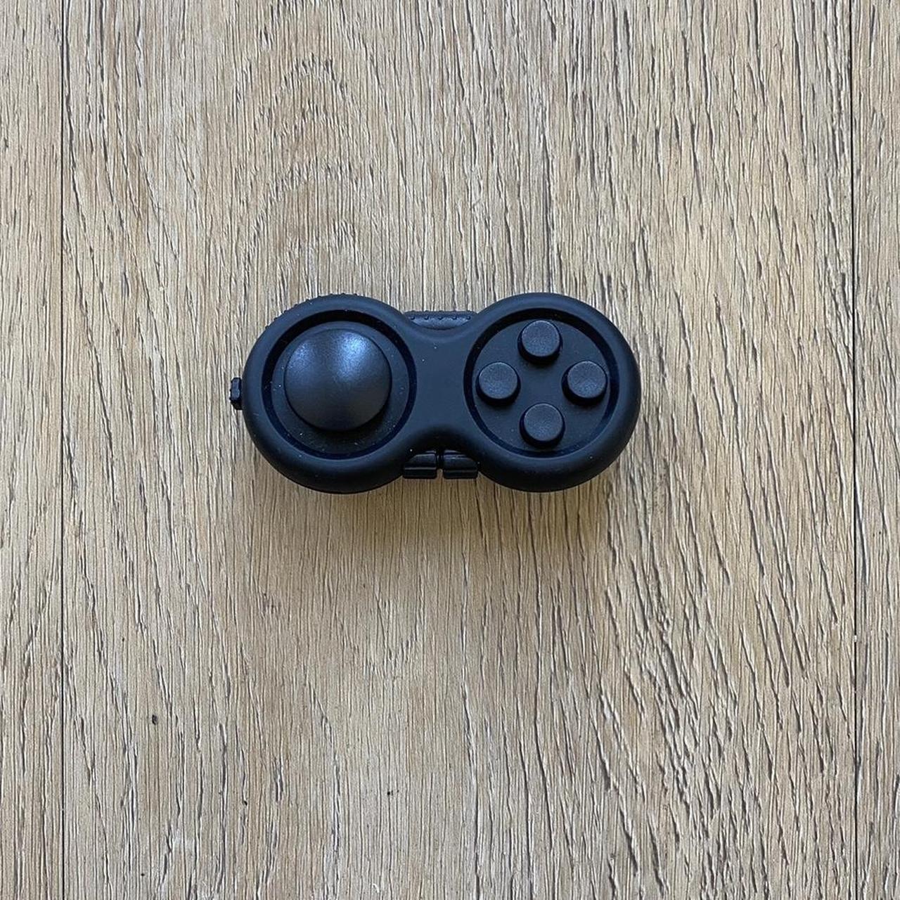 Black Fidget Toy Barely used so in excellent... - Depop