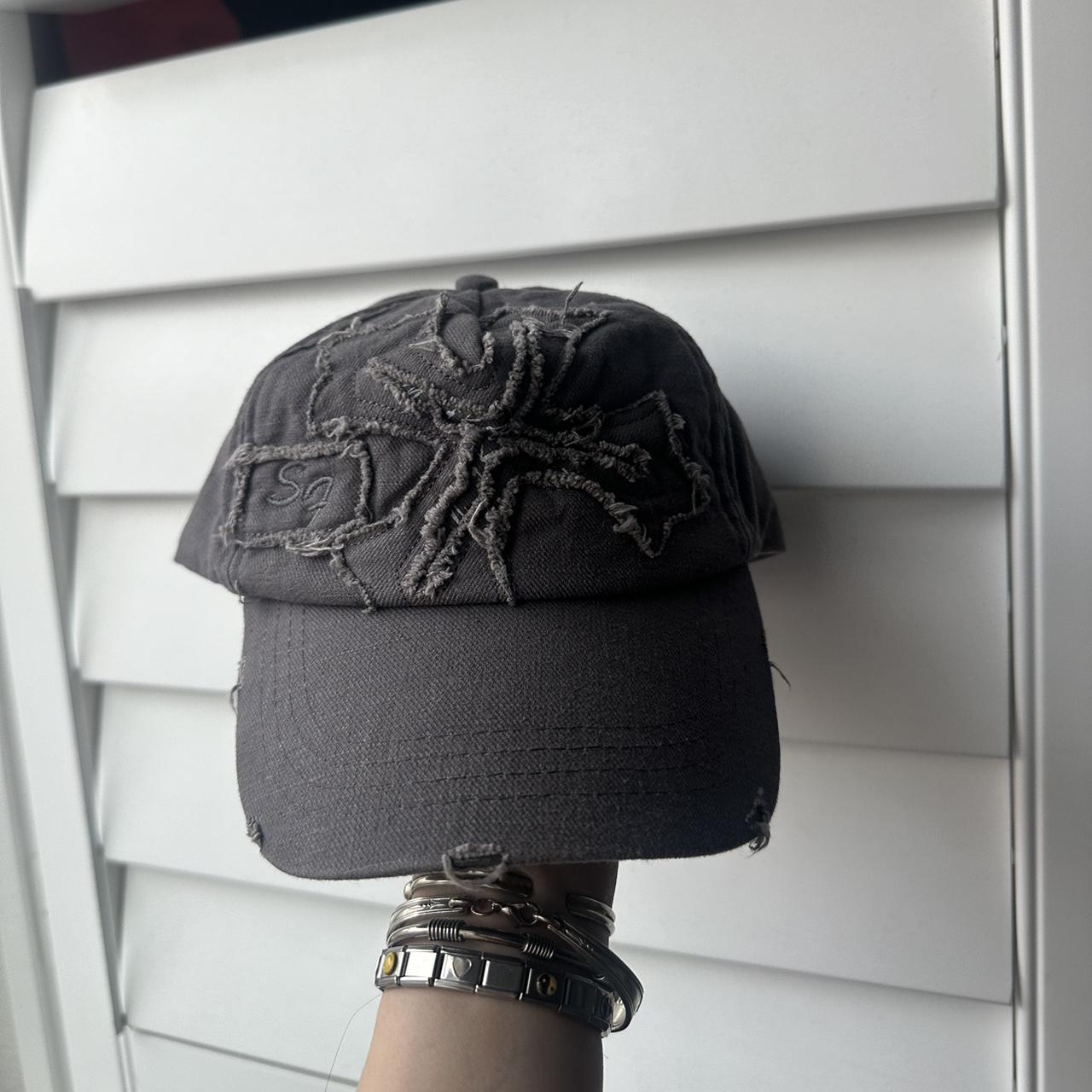 Black distressed cadet style cap with a unique... - Depop