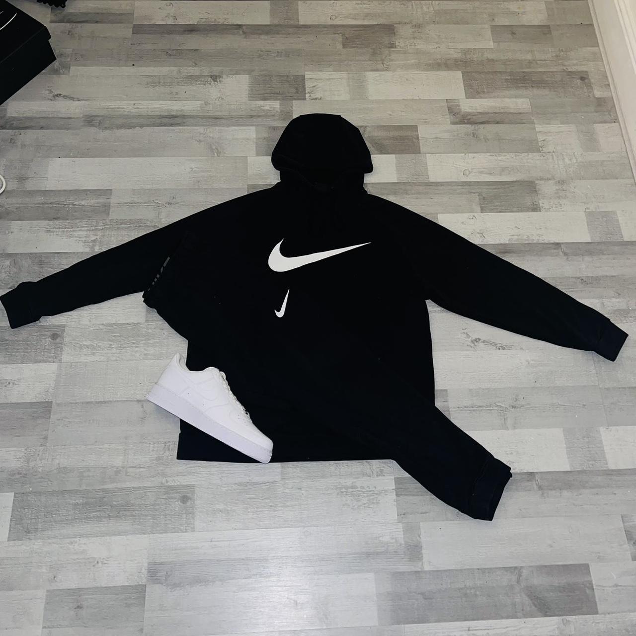 Nike tracksuit bottoms Size L Small tear on back... - Depop