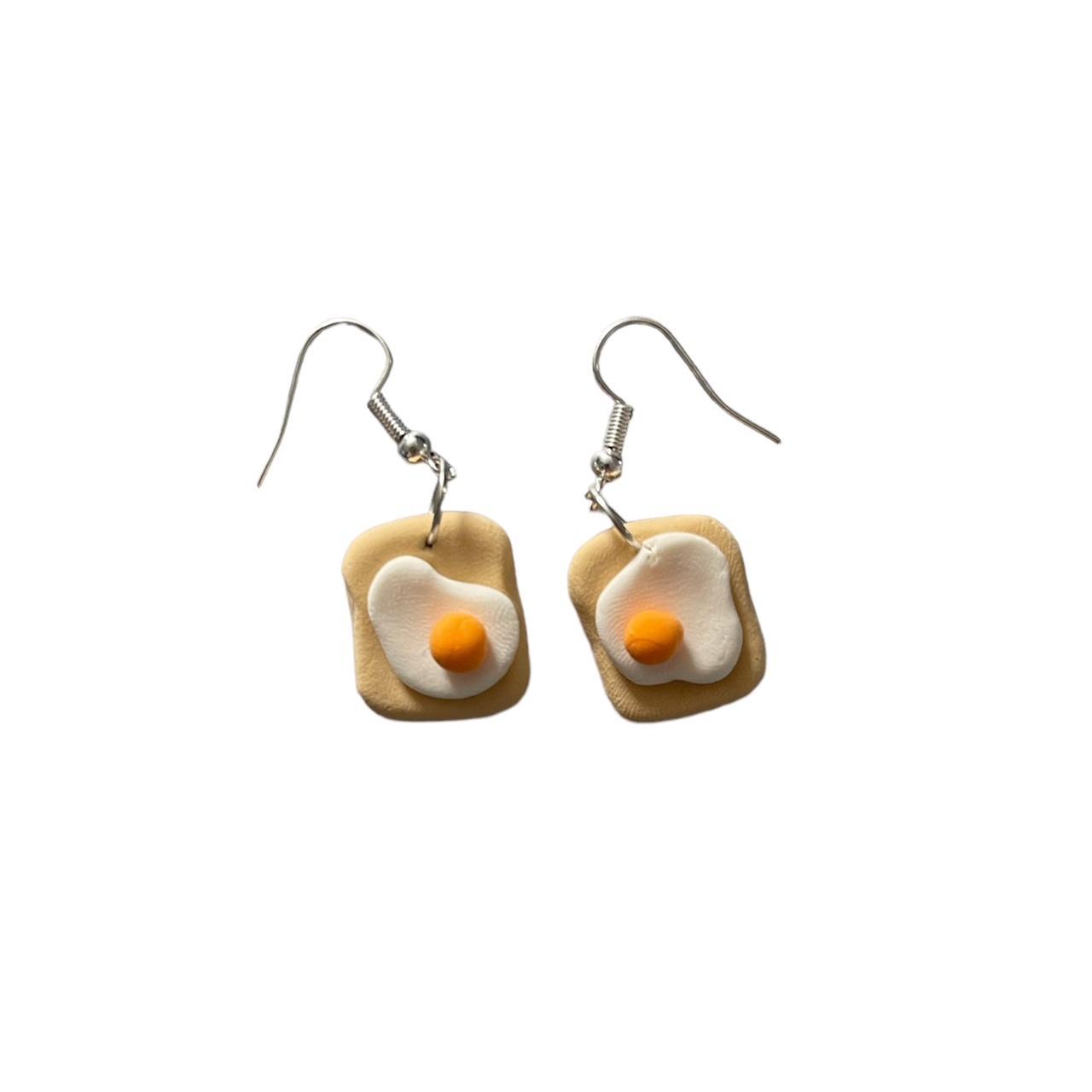 These unique and quirky egg on toast earrings pair... - Depop
