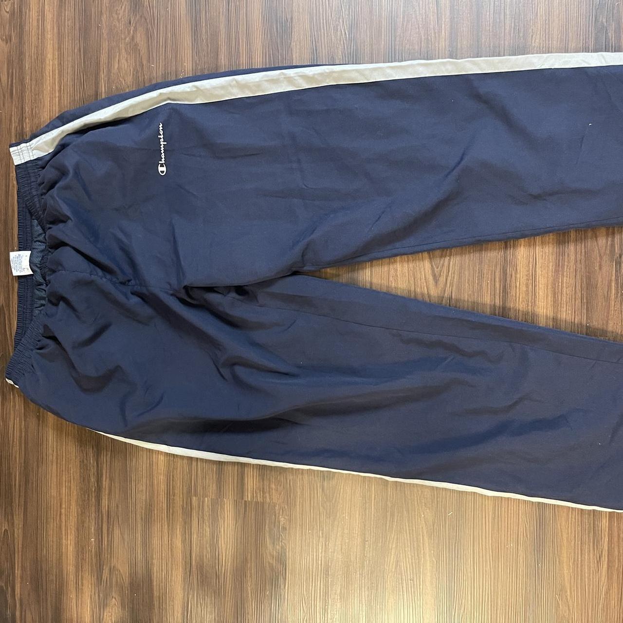 Navy and white Champion track pants. Barely worn... - Depop