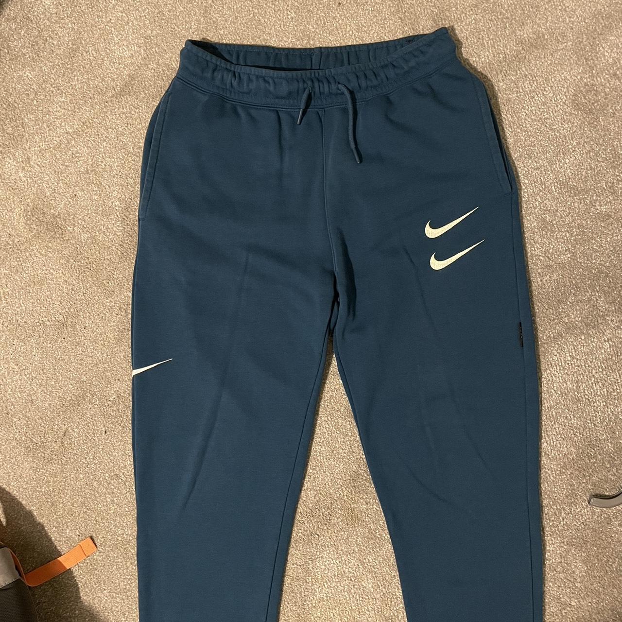 Nike tracksuit bottoms/ trackies in teal. Size... - Depop