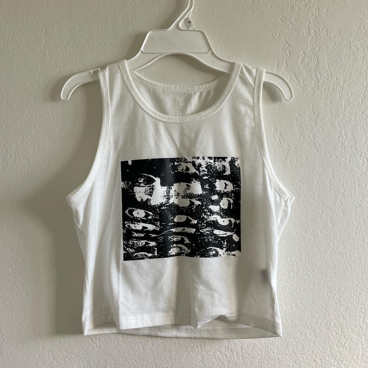 -black and white graphic tank top -would best fit a... - Depop