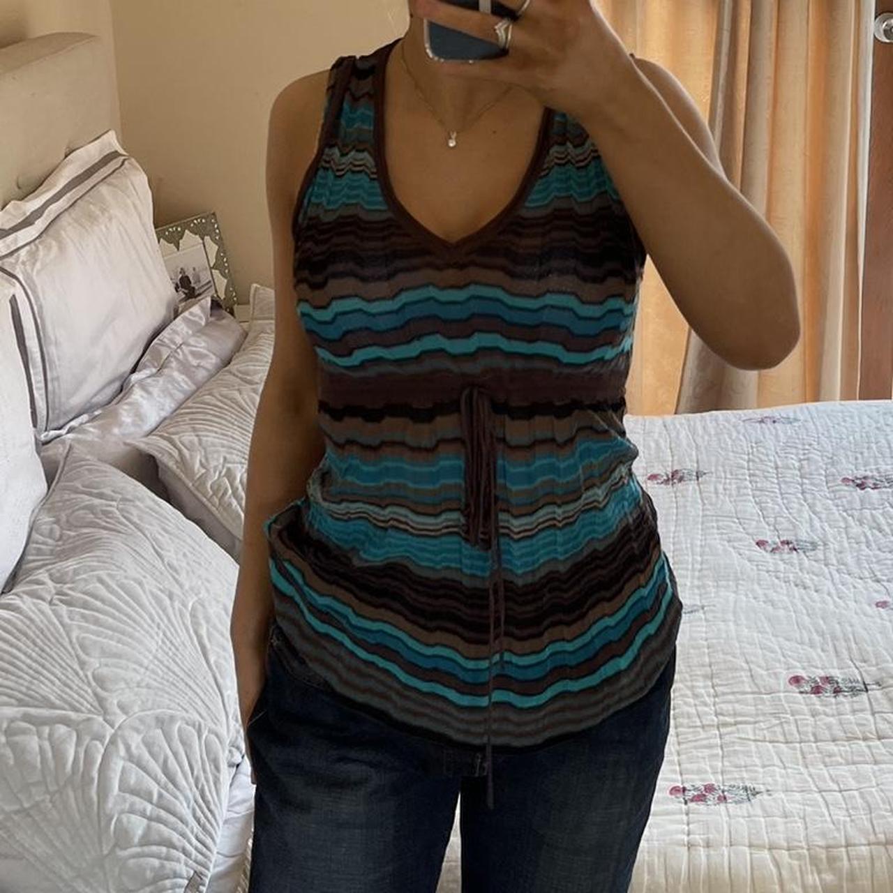 Cute sleeveless v neck knitted singlet top from... - Depop