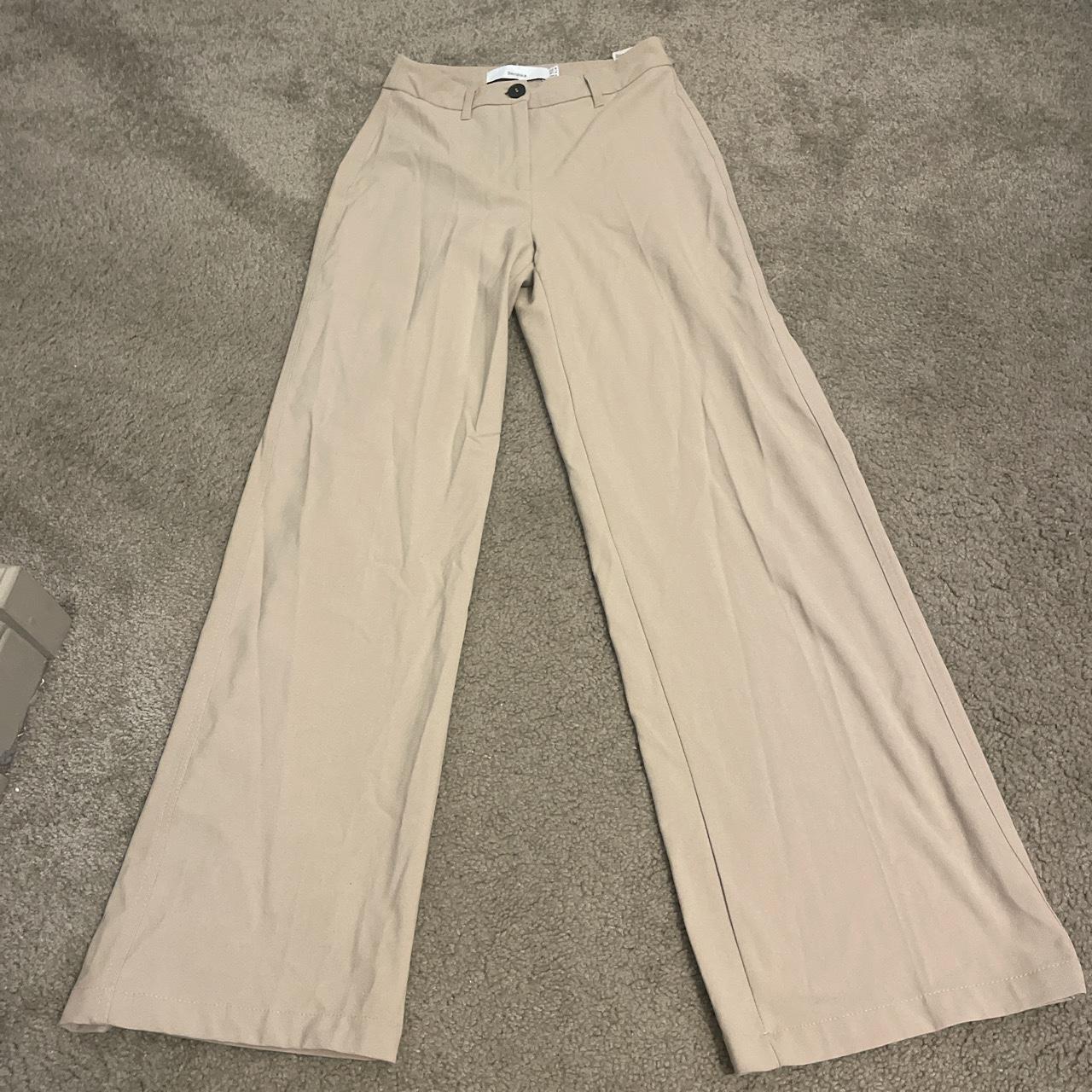 Tan slacks wide leg and form fitting Berska size 4... - Depop