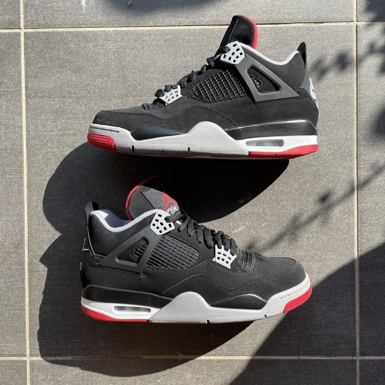 Jordan bred 4 - Depop