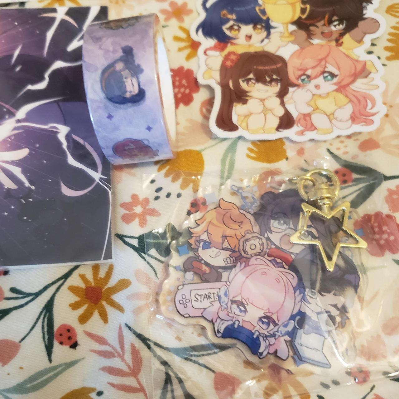 7 pieces genshin zine merch, plus a Raiden Shogun... - Depop