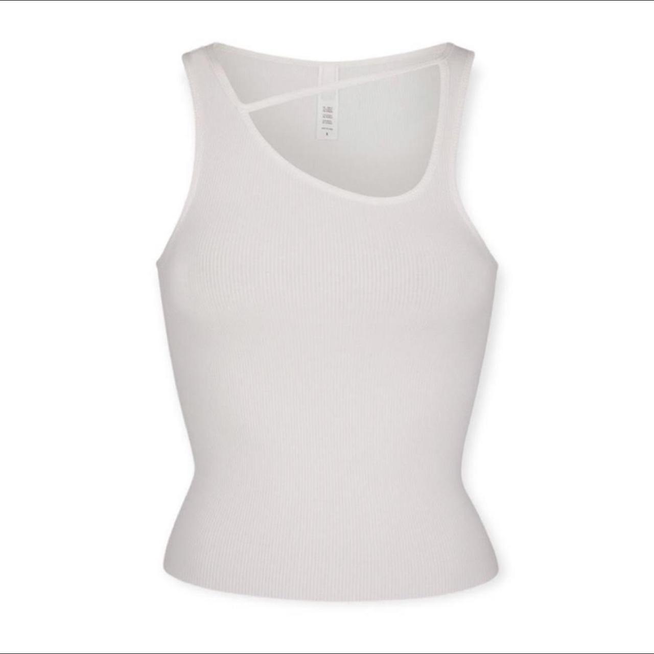 Cream colored Skims tank from the vintage collection... - Depop