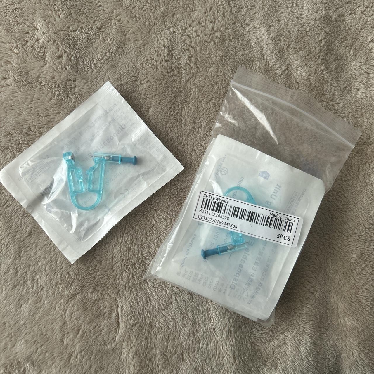 AT HOME ear piercing kit comes with 5 each with an... - Depop