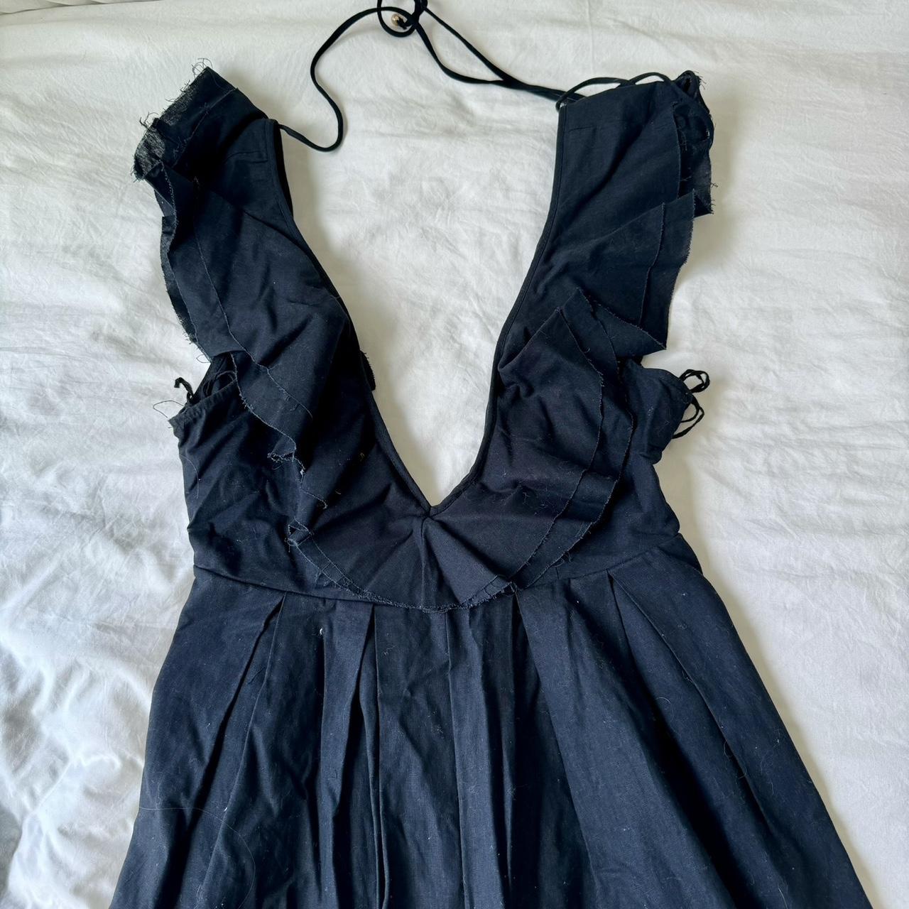 Free People black flowy jumpsuit/romper - Depop