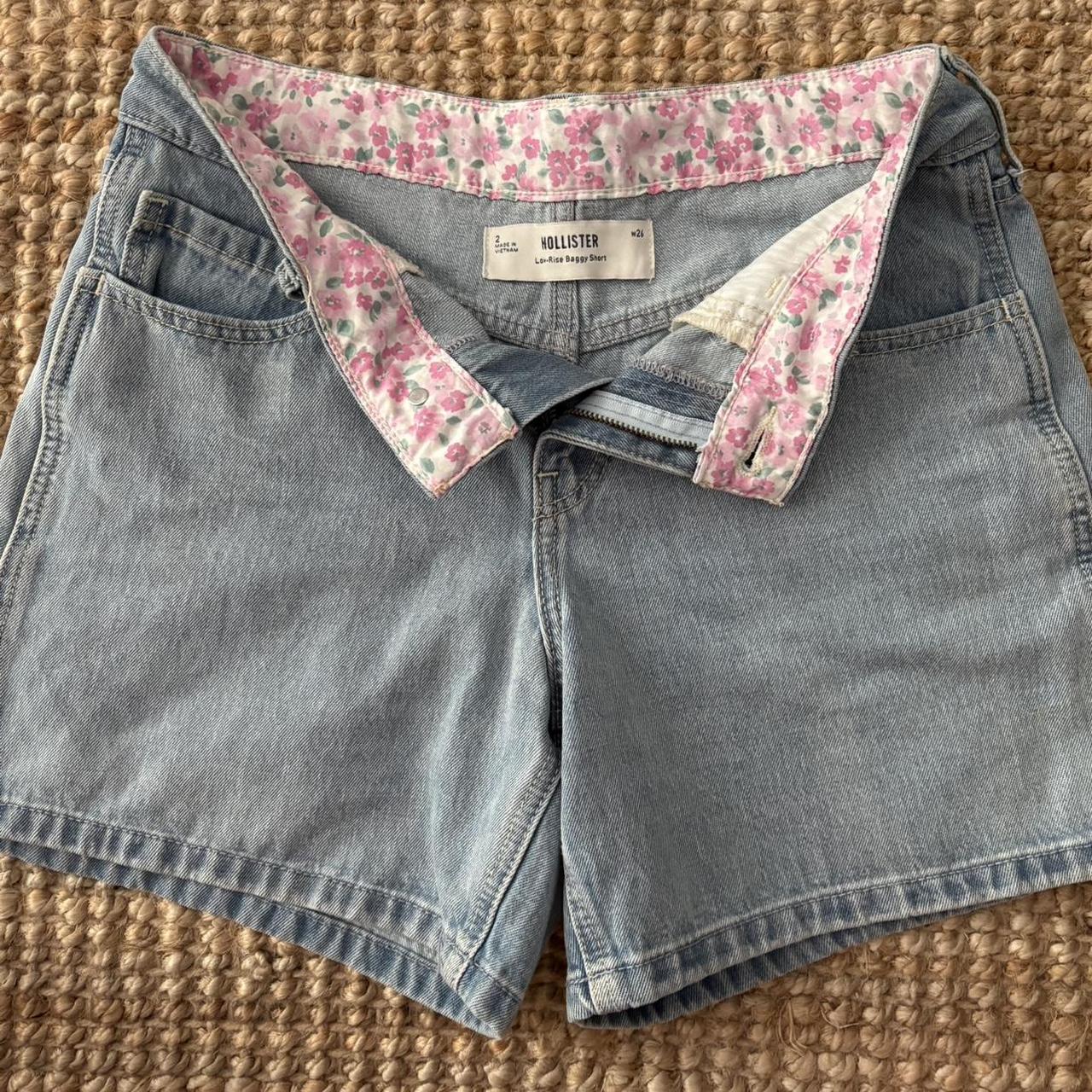 Hollister low rise baggy jorts with pink floral... | Depop
