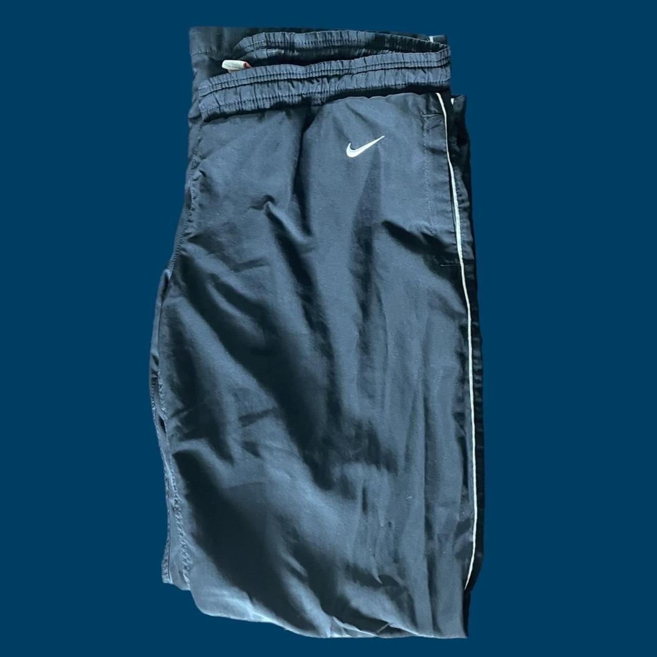 NIKE TRACKSUIT PANTS with embroidered logo, stripe... - Depop