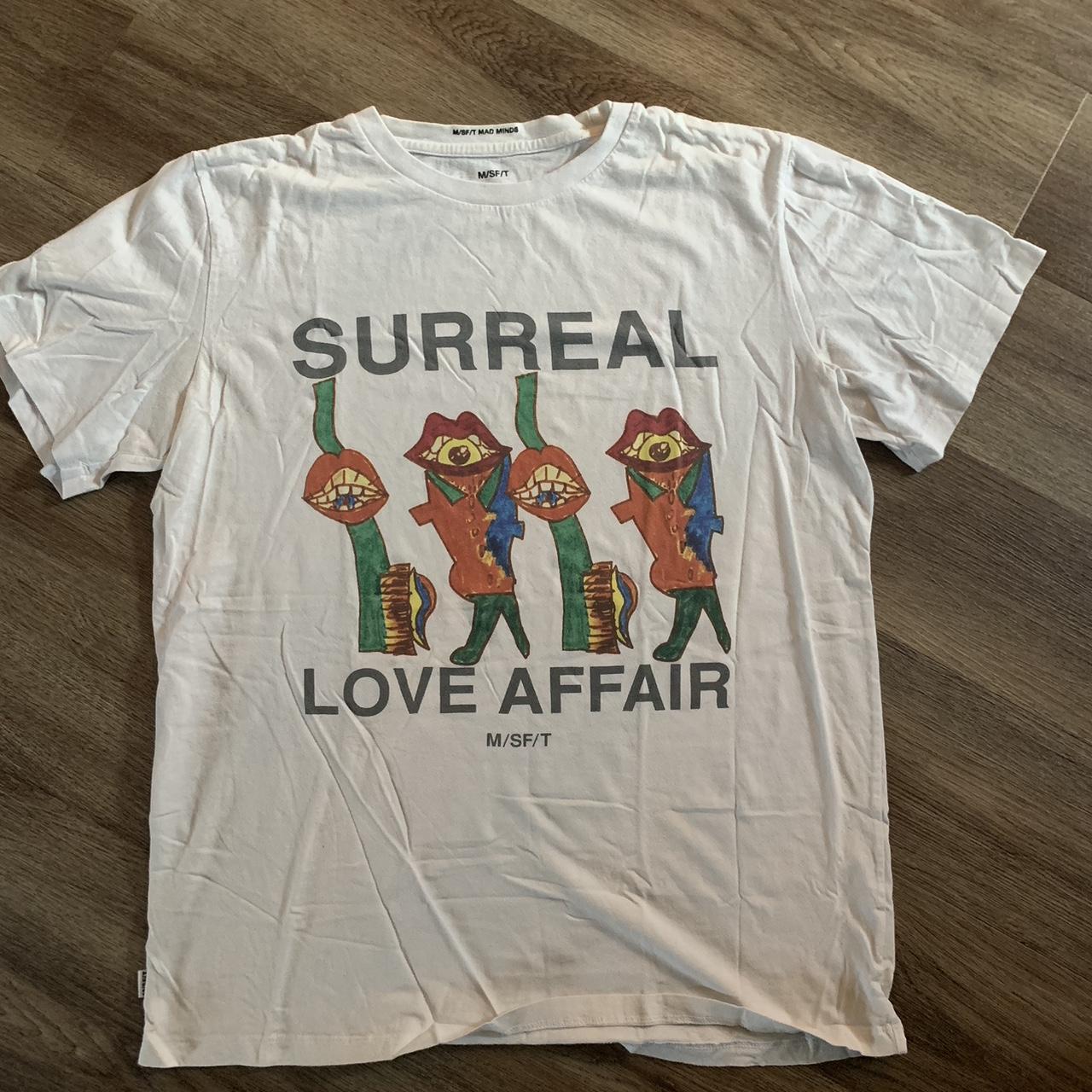 MISFIT Mad Minds Surreal Love Affair T-Shirt... - Depop