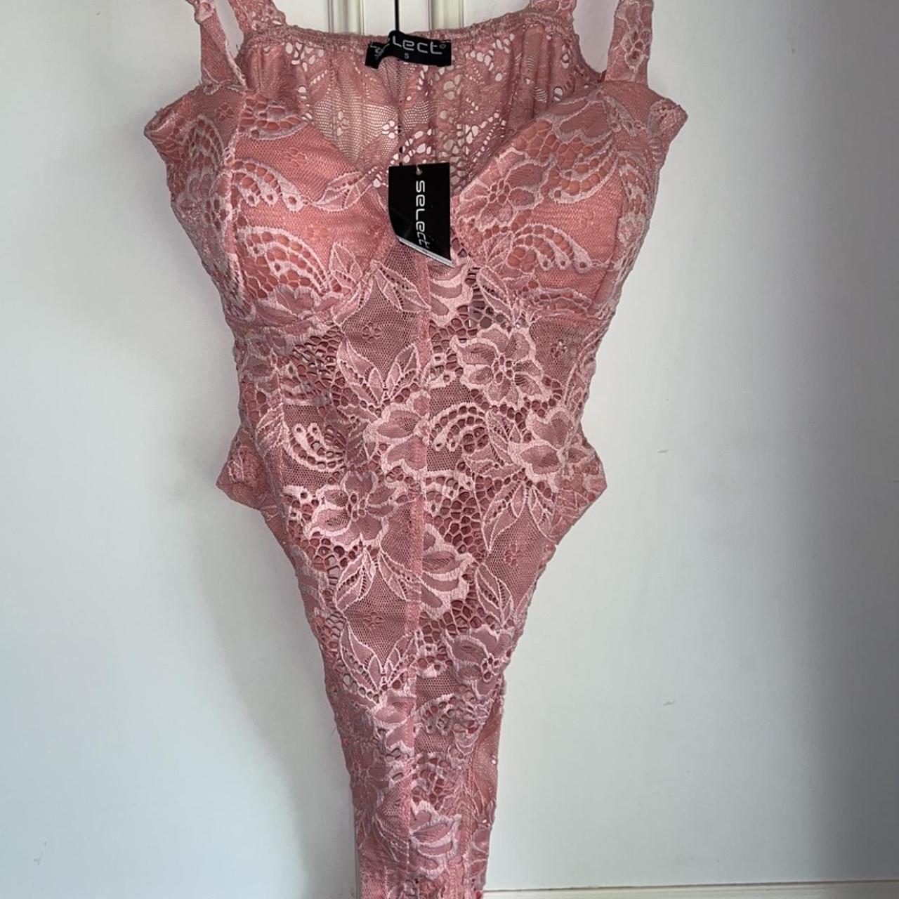 Gorgeous pink body suit never been worn still got... - Depop