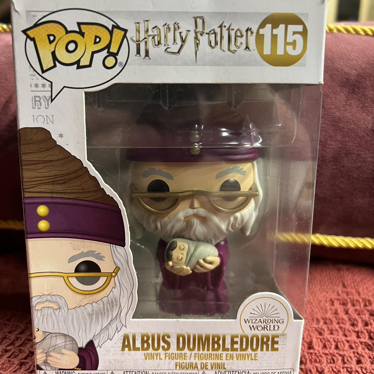 albus dumbledore with baby philosophers stone pop... - Depop