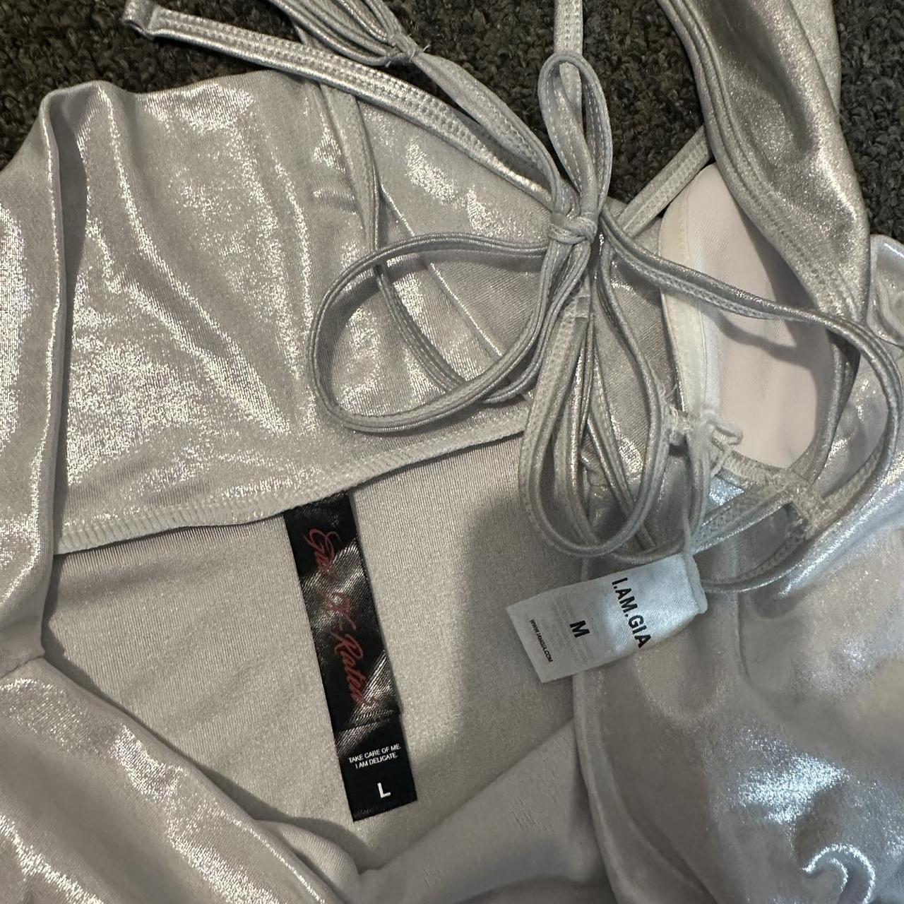 I am Gia silver set. Top size medium, skirt size... - Depop