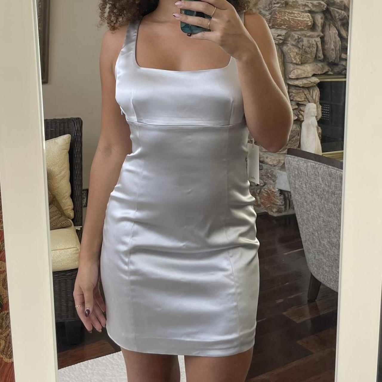 Absolutely gorgeous pearlescent silver satin mini... | Depop