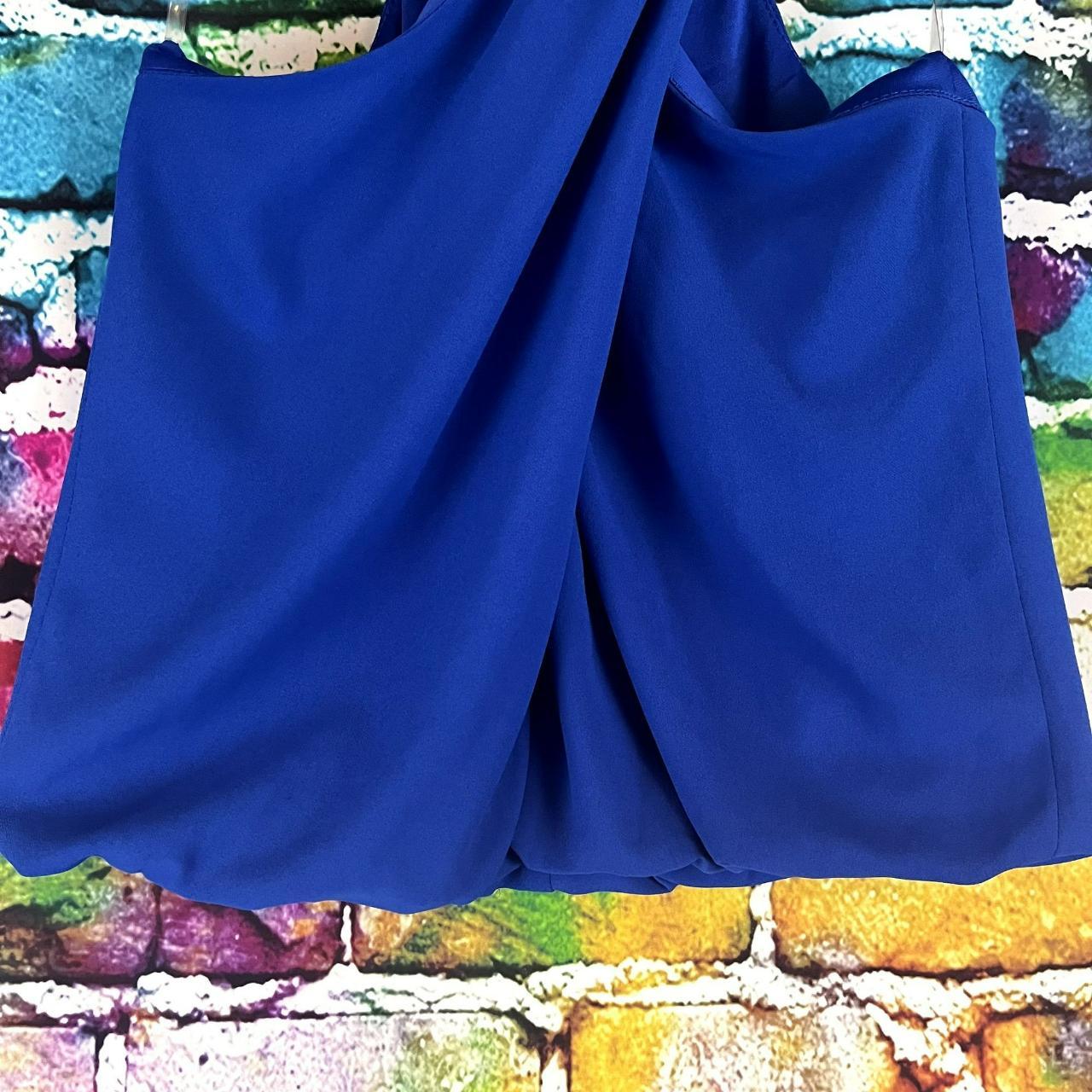 Ina Elastic Bottom Sleeveless Blouse Size... - Depop