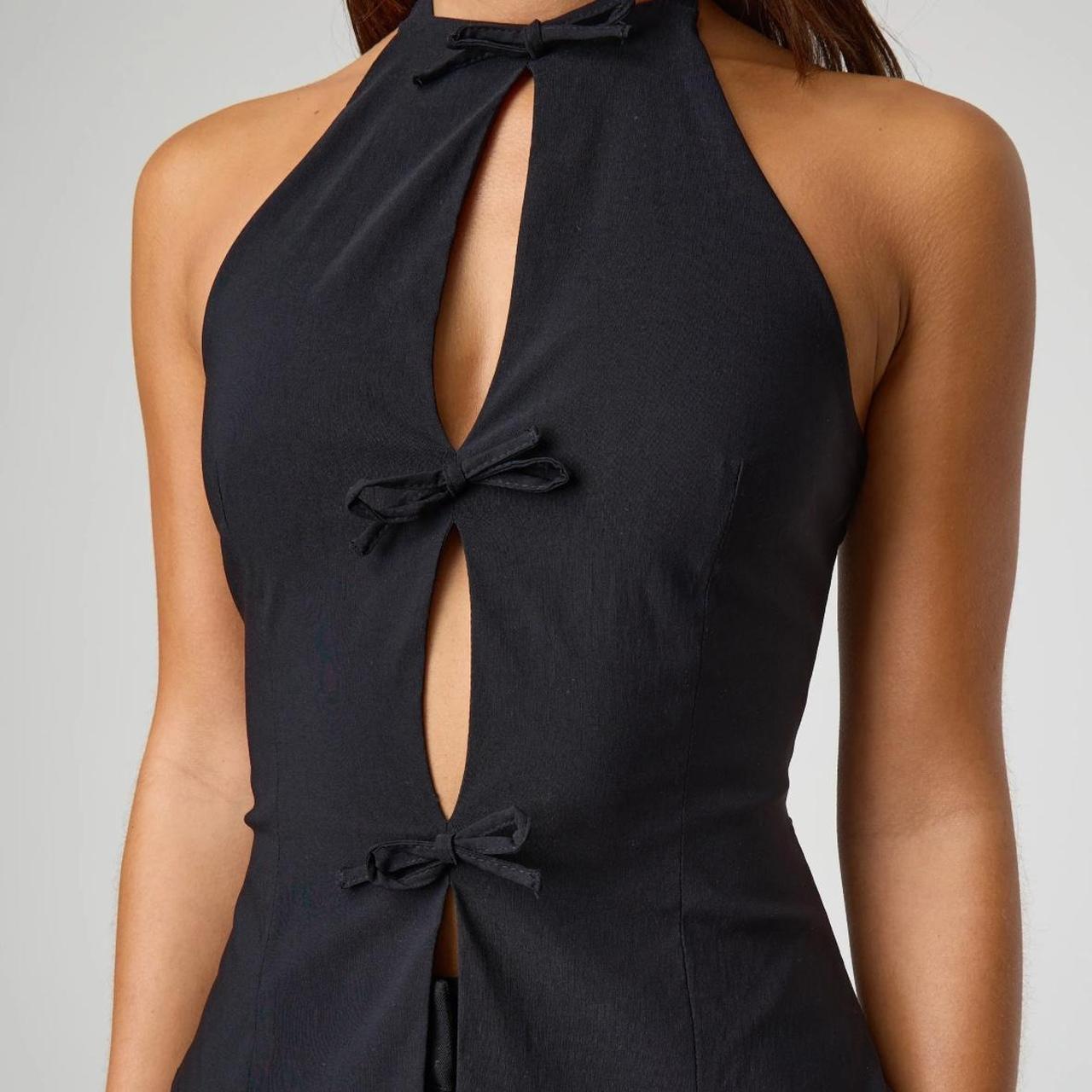 Black bow halter neck top. Tag was ripped off😅 - Depop