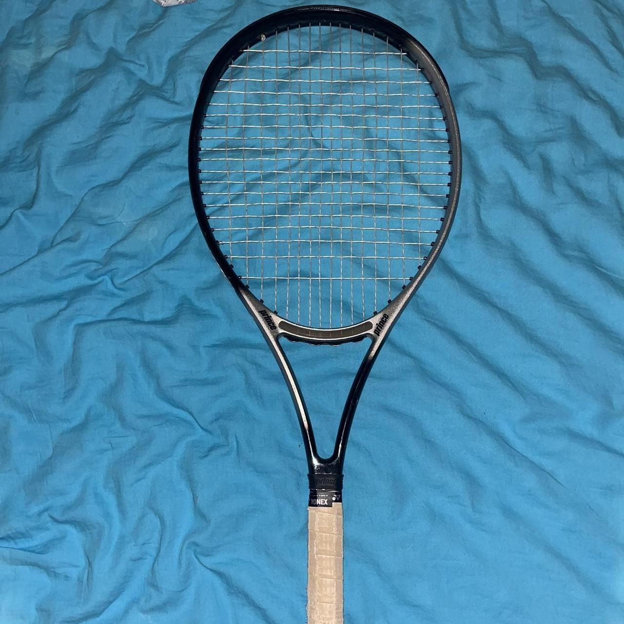 Black and white tennis racket. i started tennis on a... - Depop
