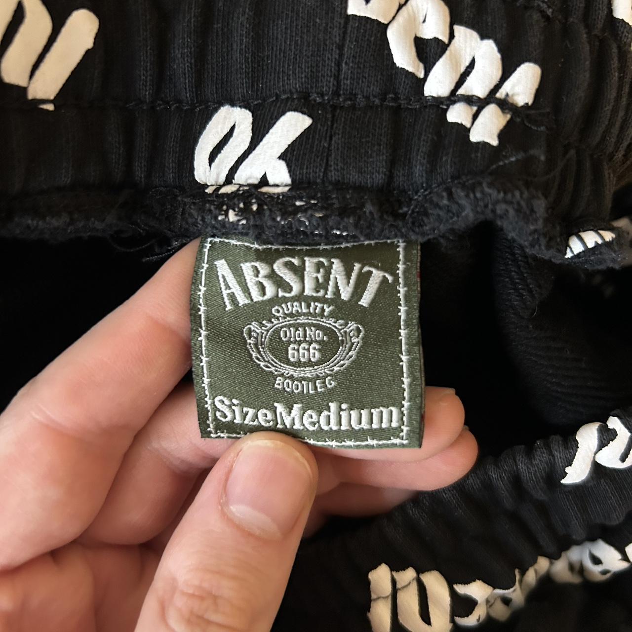 Absent All Over Logo Shorts Worn a few times, still... - Depop