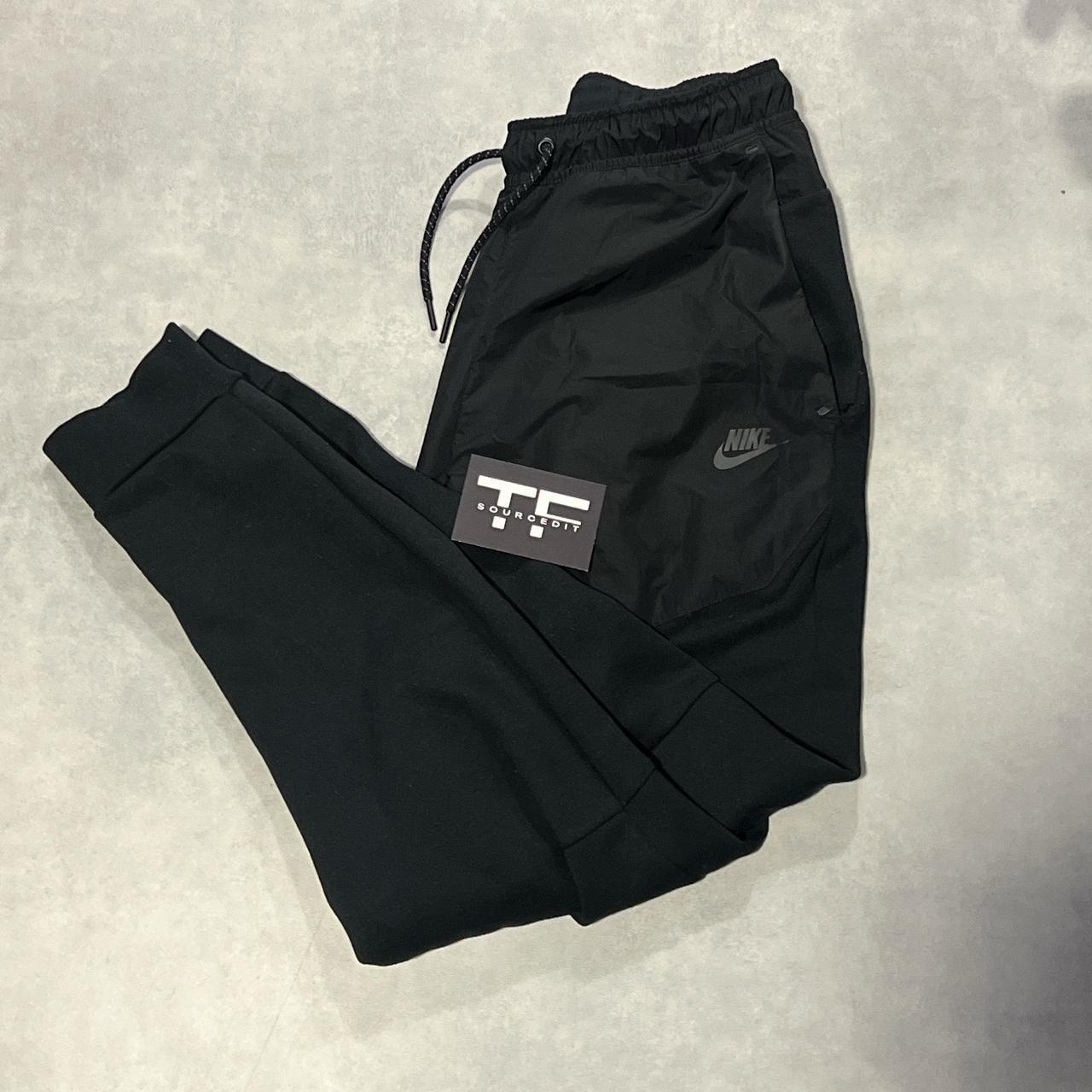 Nike black woven tech fleece Size medium Need gone... - Depop