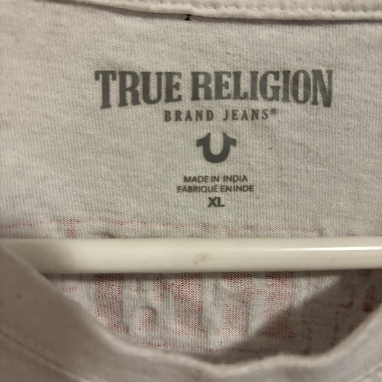 white true religion graphic tee fits like a size... - Depop