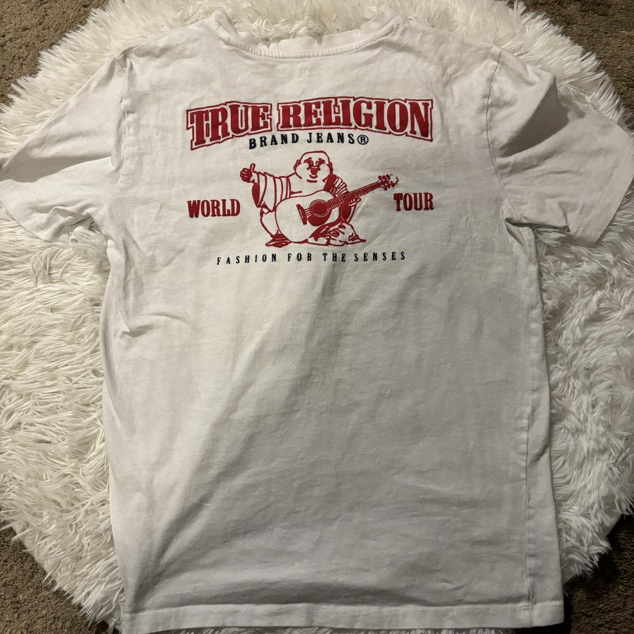 white true religion graphic tee fits like a size... - Depop