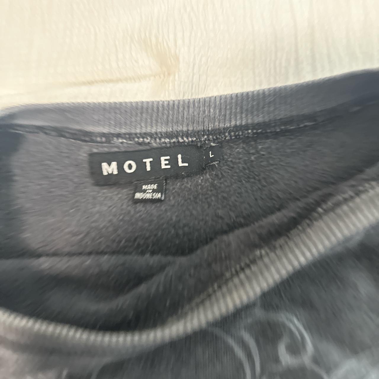 cute motel rocks oversized crewneck. has minor makes... - Depop
