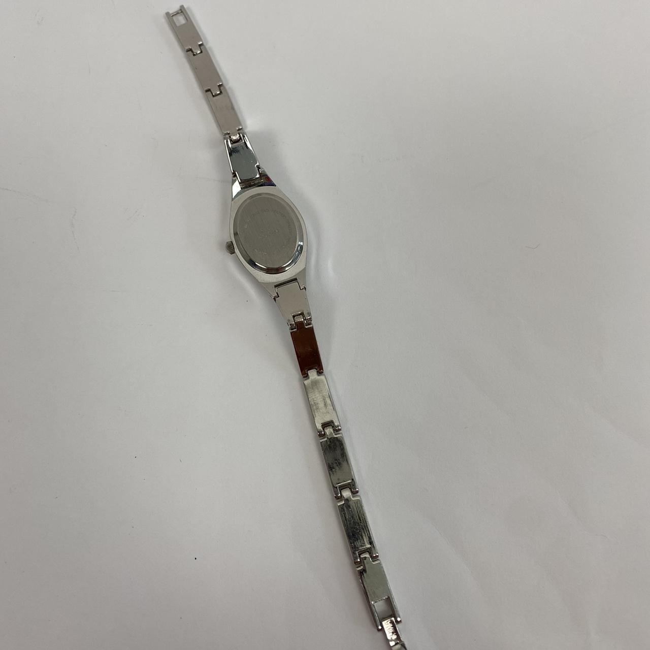 1.1 oz Retro quartz unbranded watch Face has a blue... - Depop