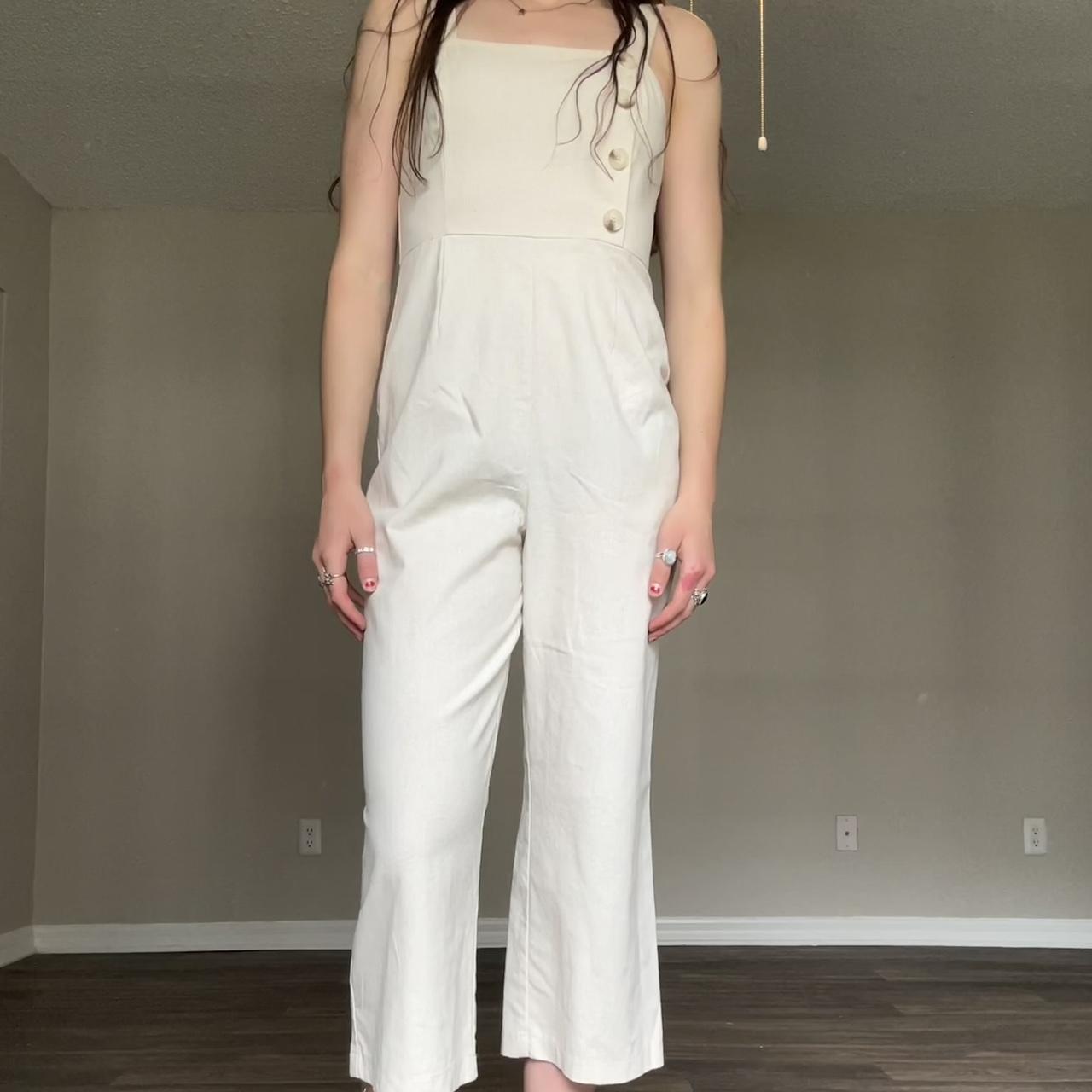 - Large cream colored jumpsuit/romper - Model is... - Depop