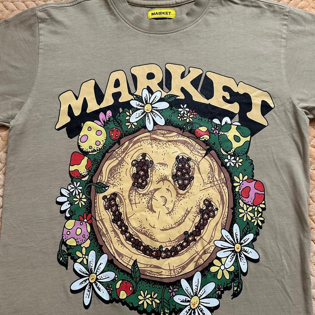 Chinatown Market Smiley graphic tee. Tagged size... | Depop
