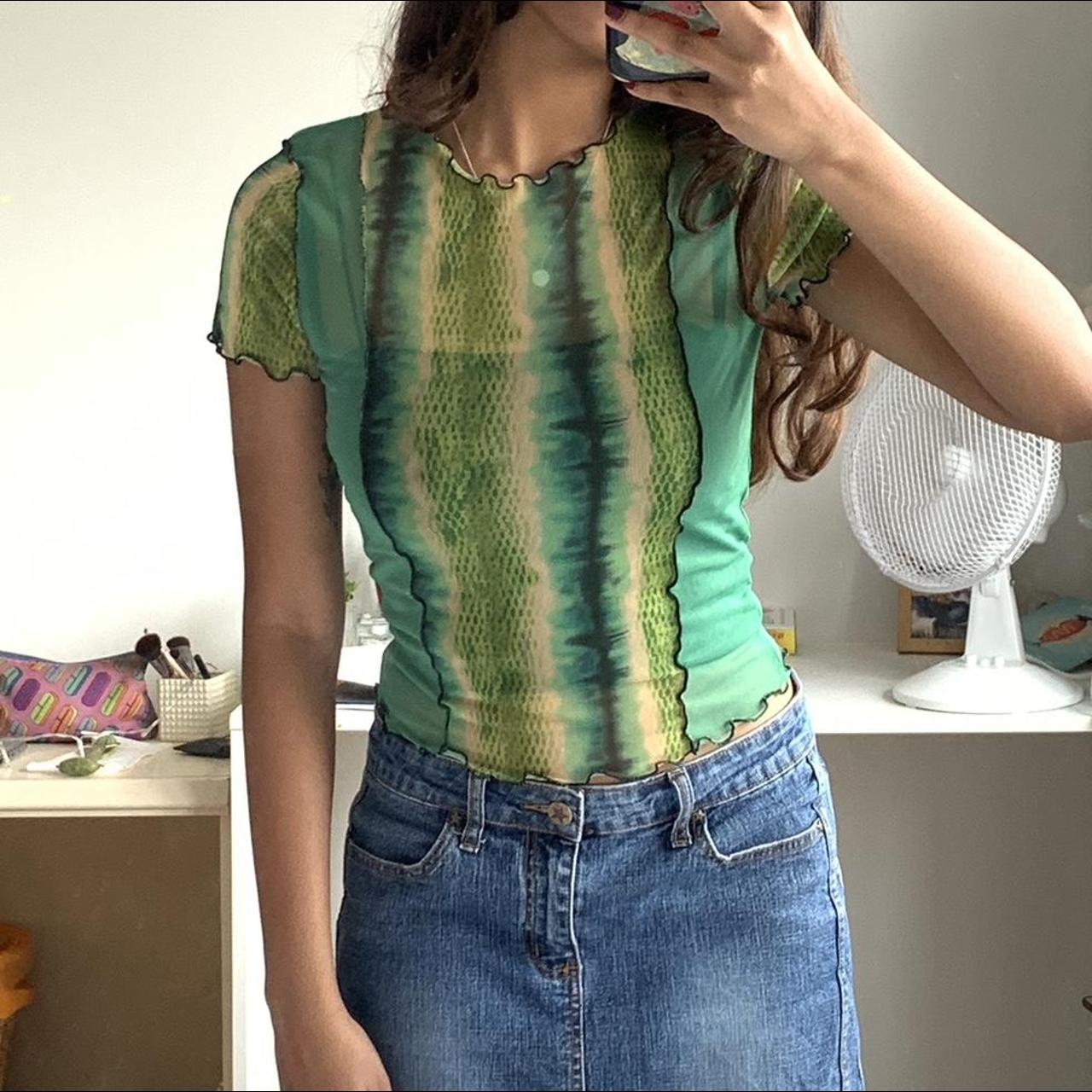 Green mesh top with lettuce hem detailing. Size:... - Depop