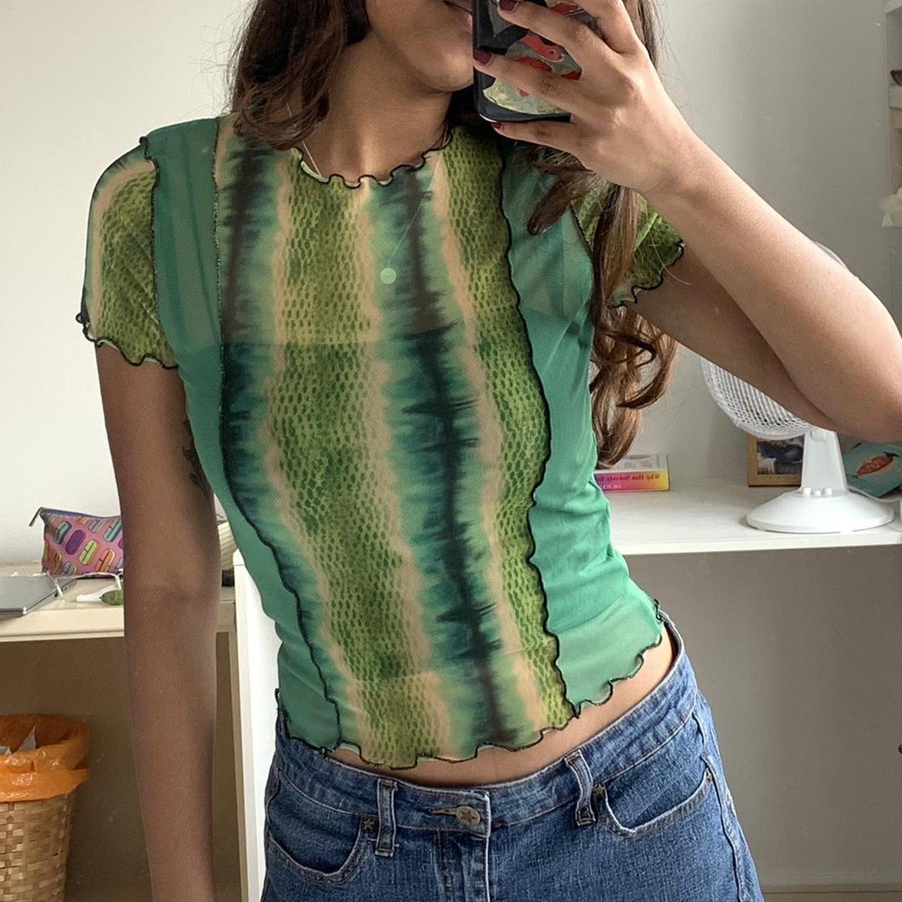 Green mesh top with lettuce hem detailing. Size:... - Depop