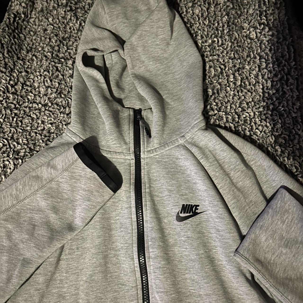 Gray Nike Tech Jacket Size small - Depop