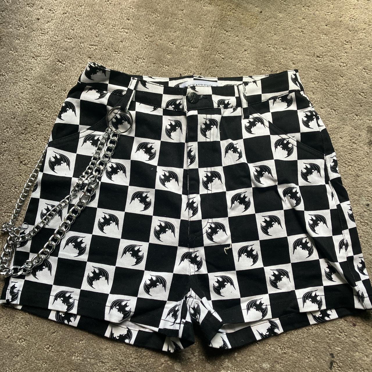 Black and white checkered shorts with bat print and... - Depop