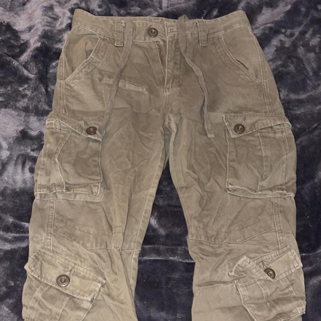 Dark green cargo pants color irl is darker than... - Depop