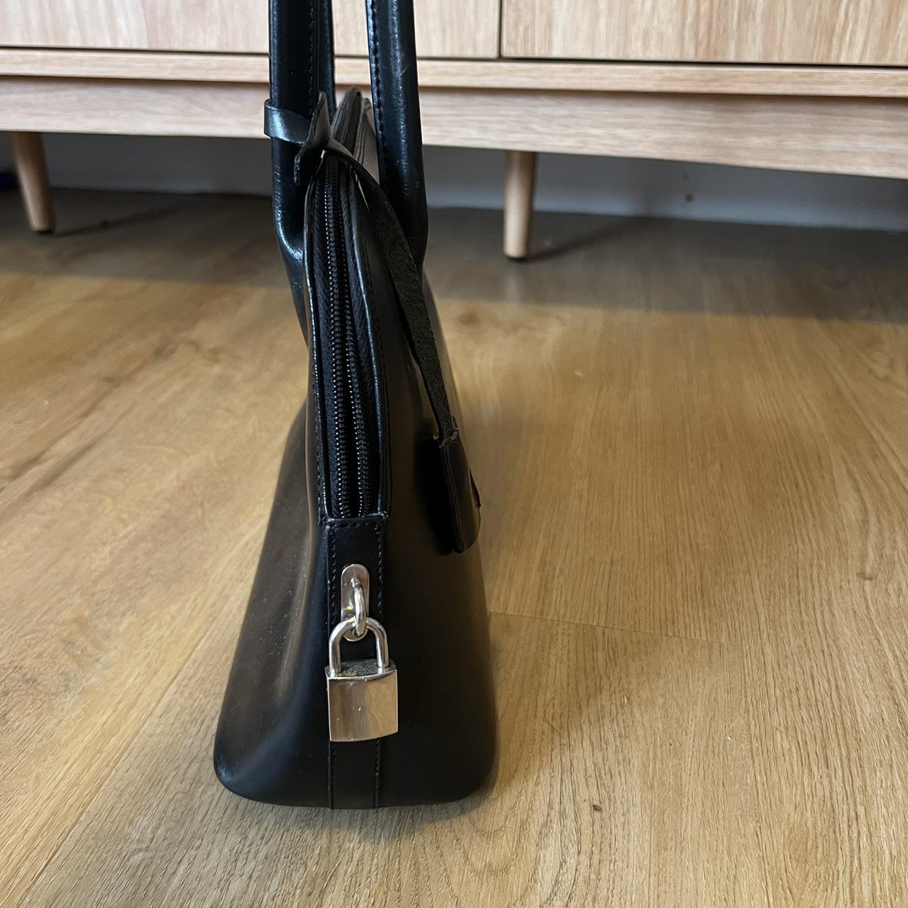 Small black handbag with lock and key - Depop