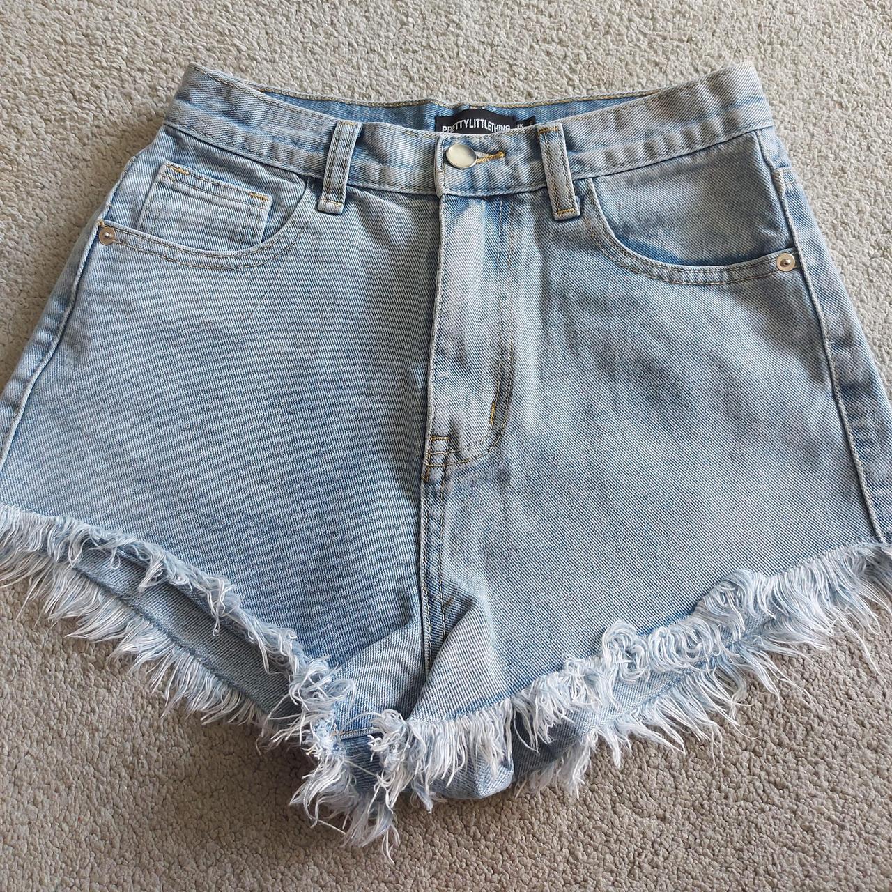 Denim shorts with frayed hem from... - Depop