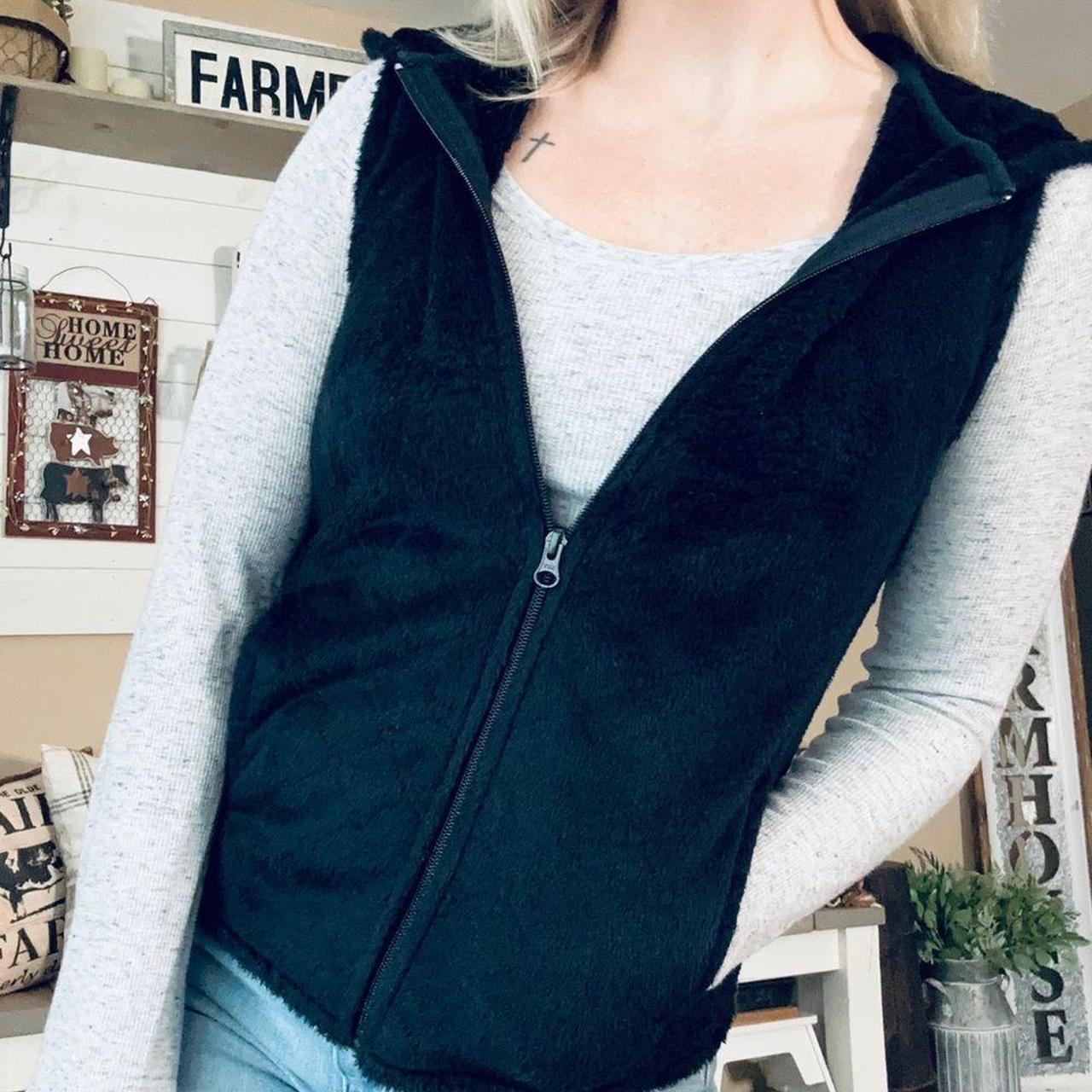 Natural Reflections Women's Black Vest | Depop