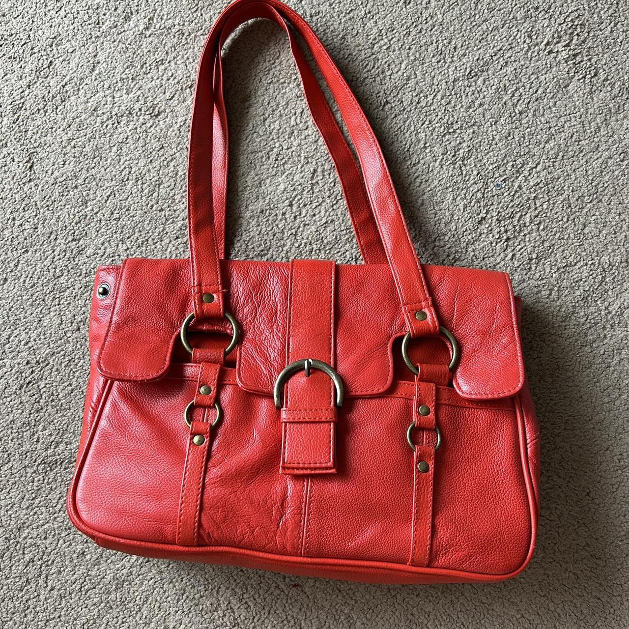red slouchy hobo bag with big buckle details 2000s... - Depop