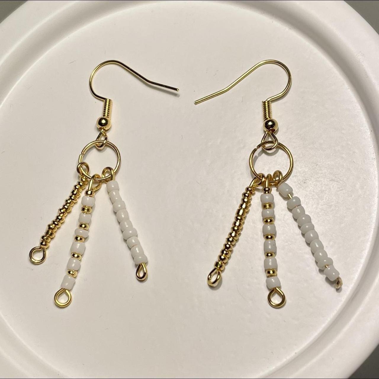 pearly bead & gold bead separated chain earrings... - Depop