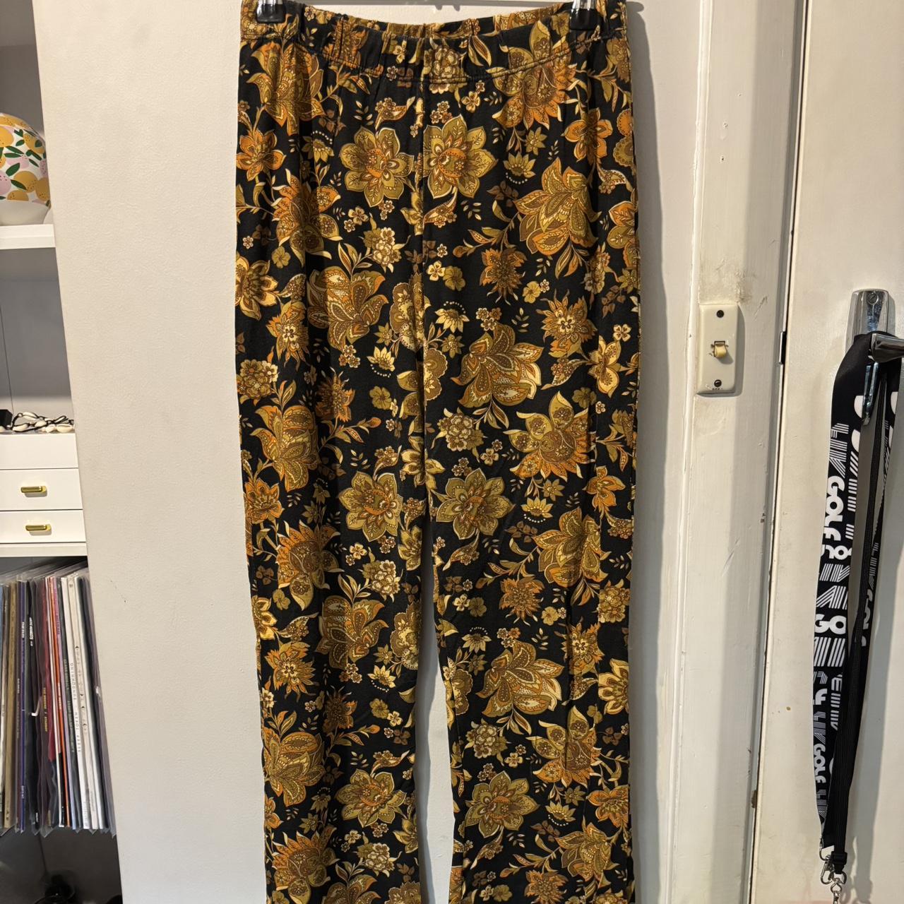 Black and gold floral high-waisted Ghanda pants 2... | Depop