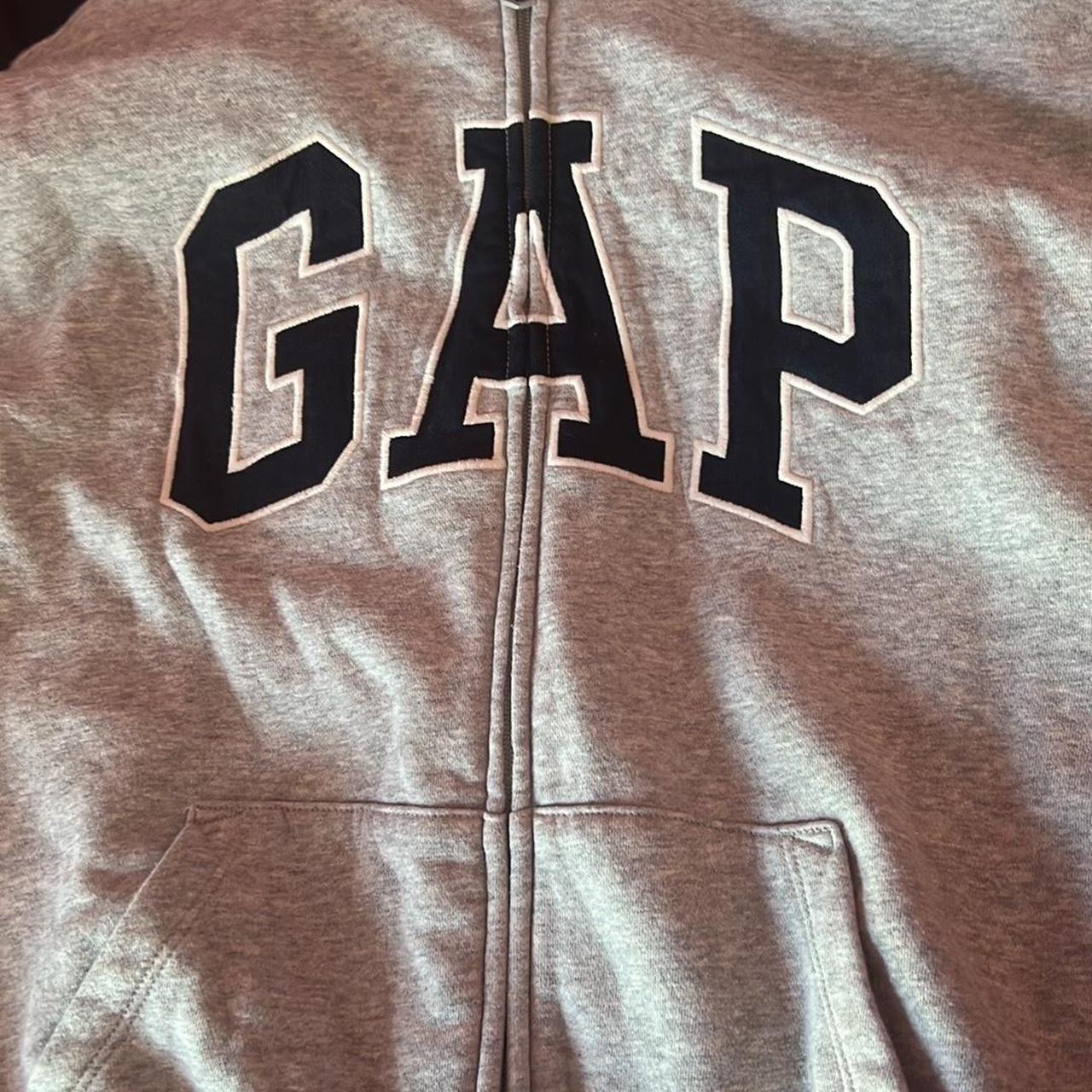 Gray Gap Zip Up in a kids XL - Depop