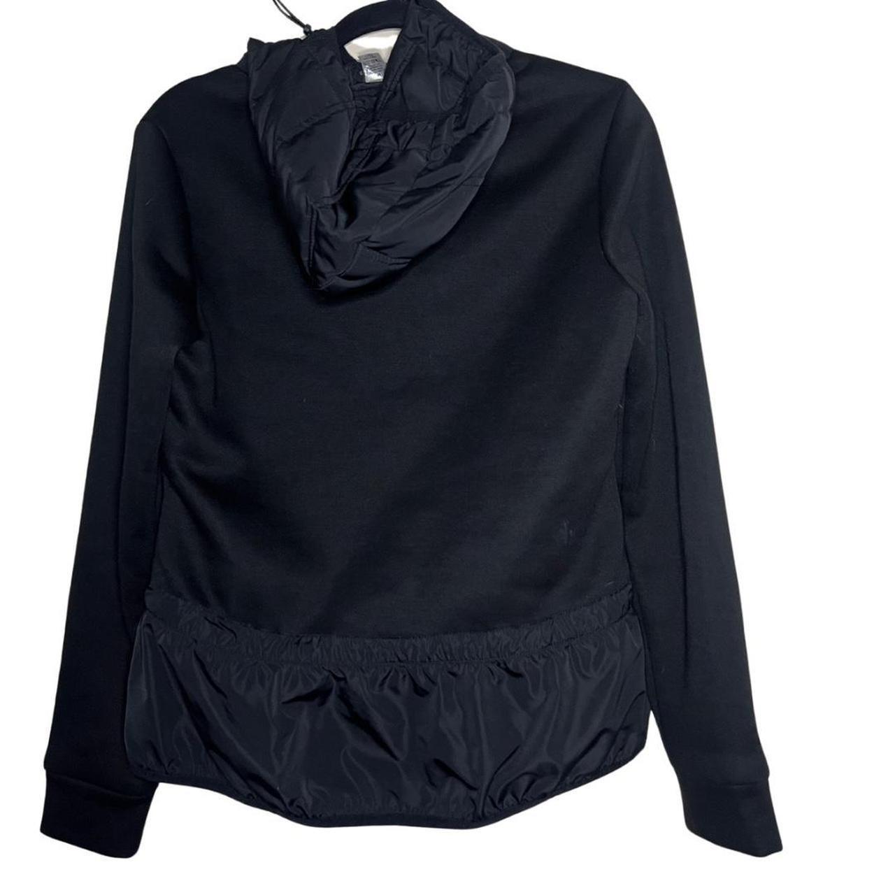 Black hooded zip-up jacket with ruffled hem and... | Depop